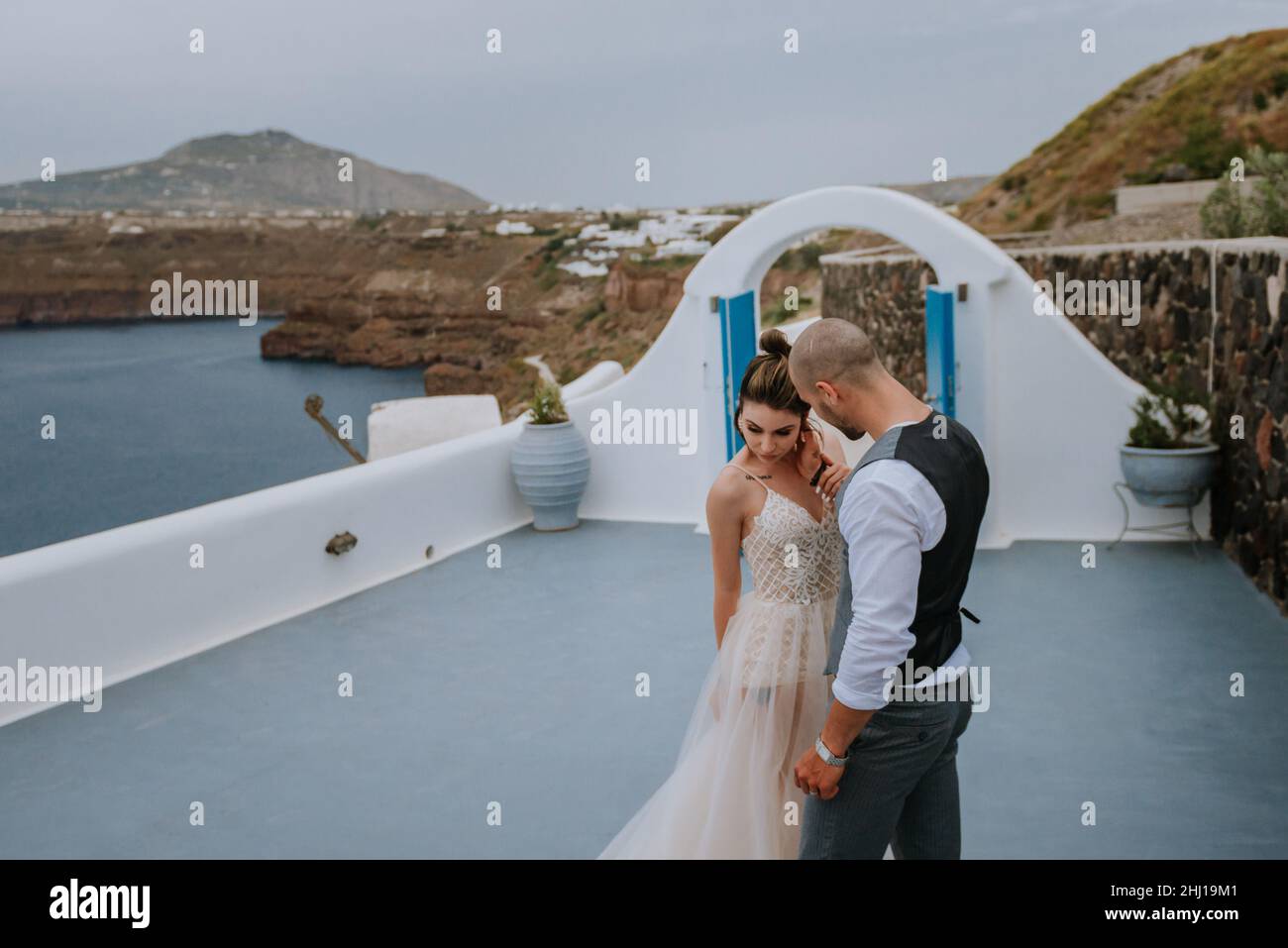 Beautiful Bride and Groom in their Summer Wedding Dy on Greek Island ...