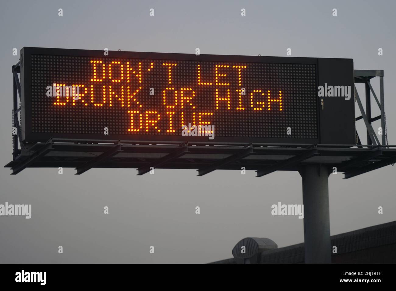 A Caltrans message board with the words "Don't let drunk or high drive ...