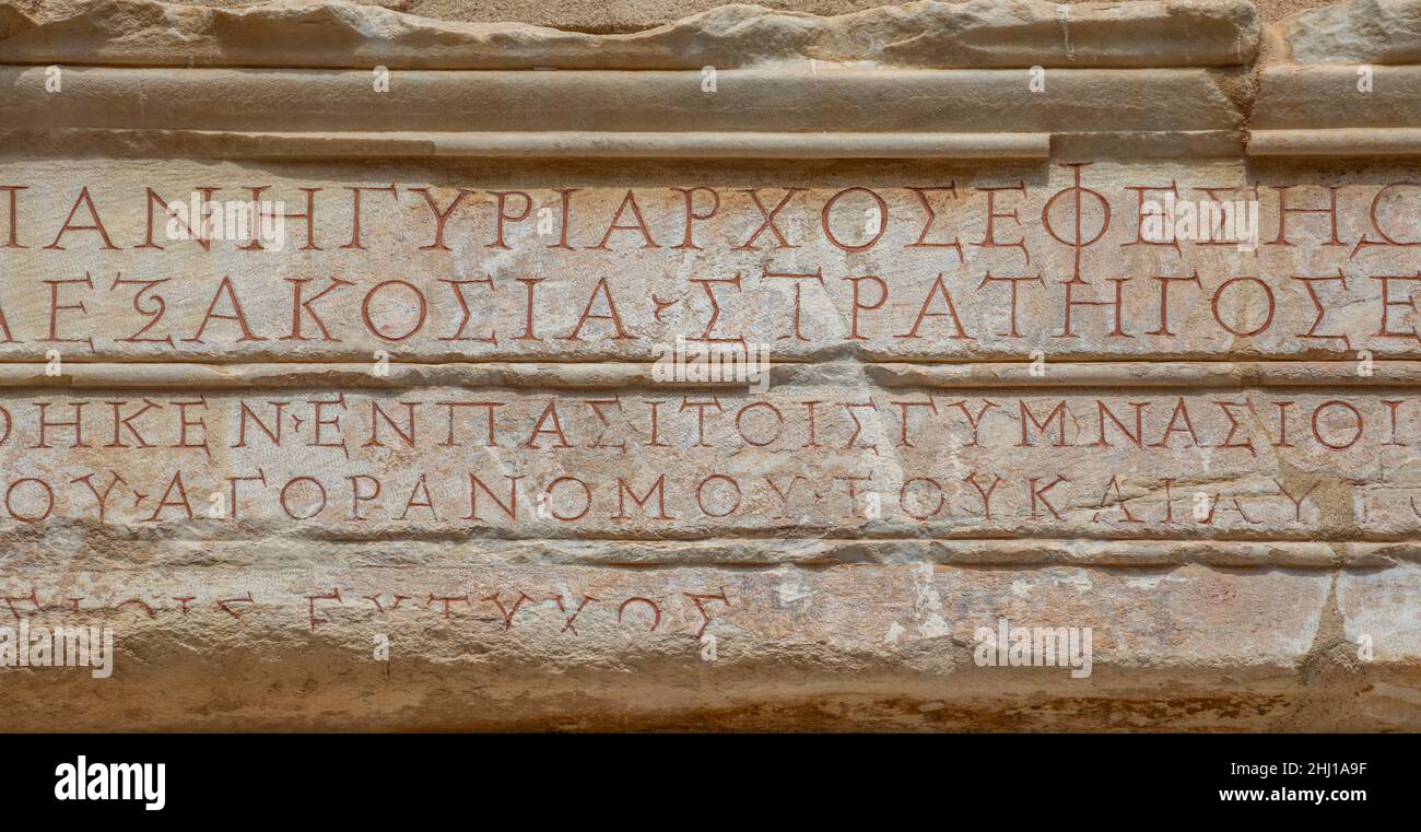 Close-up background view of Roman script samples from the ancient city ...