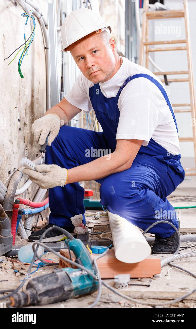 Interior building under reconstruction man hi-res stock photography and ...