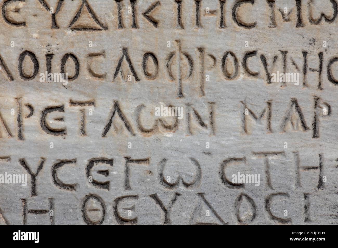 Close-up background view of Roman script samples from the ancient city ...