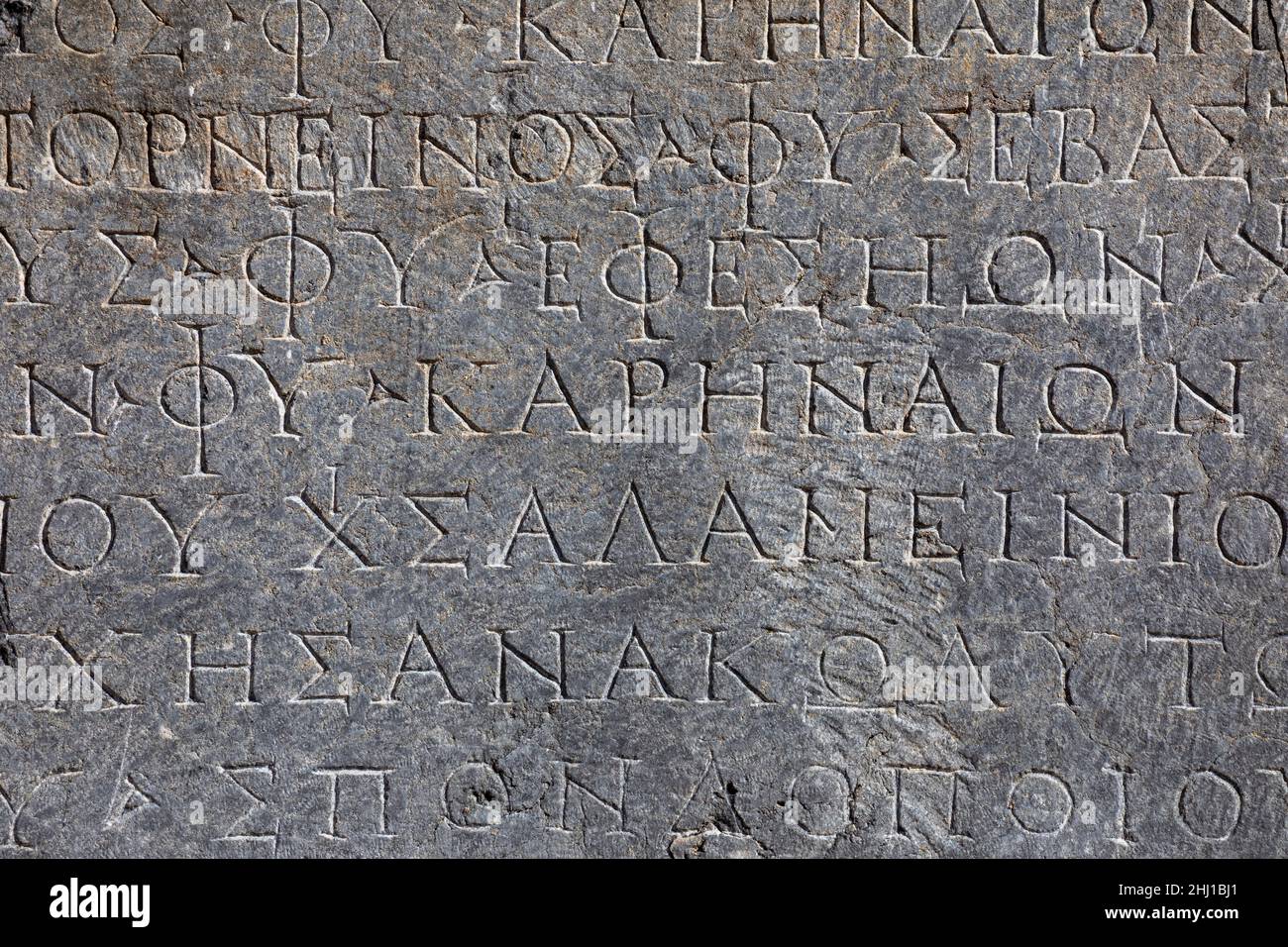 Close-up background view of Roman script samples from the ancient city ...