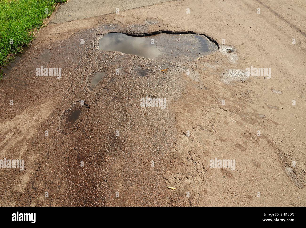 Asphalt Pavement Distress. Pavement Distress. Asphalt Potholes with ...