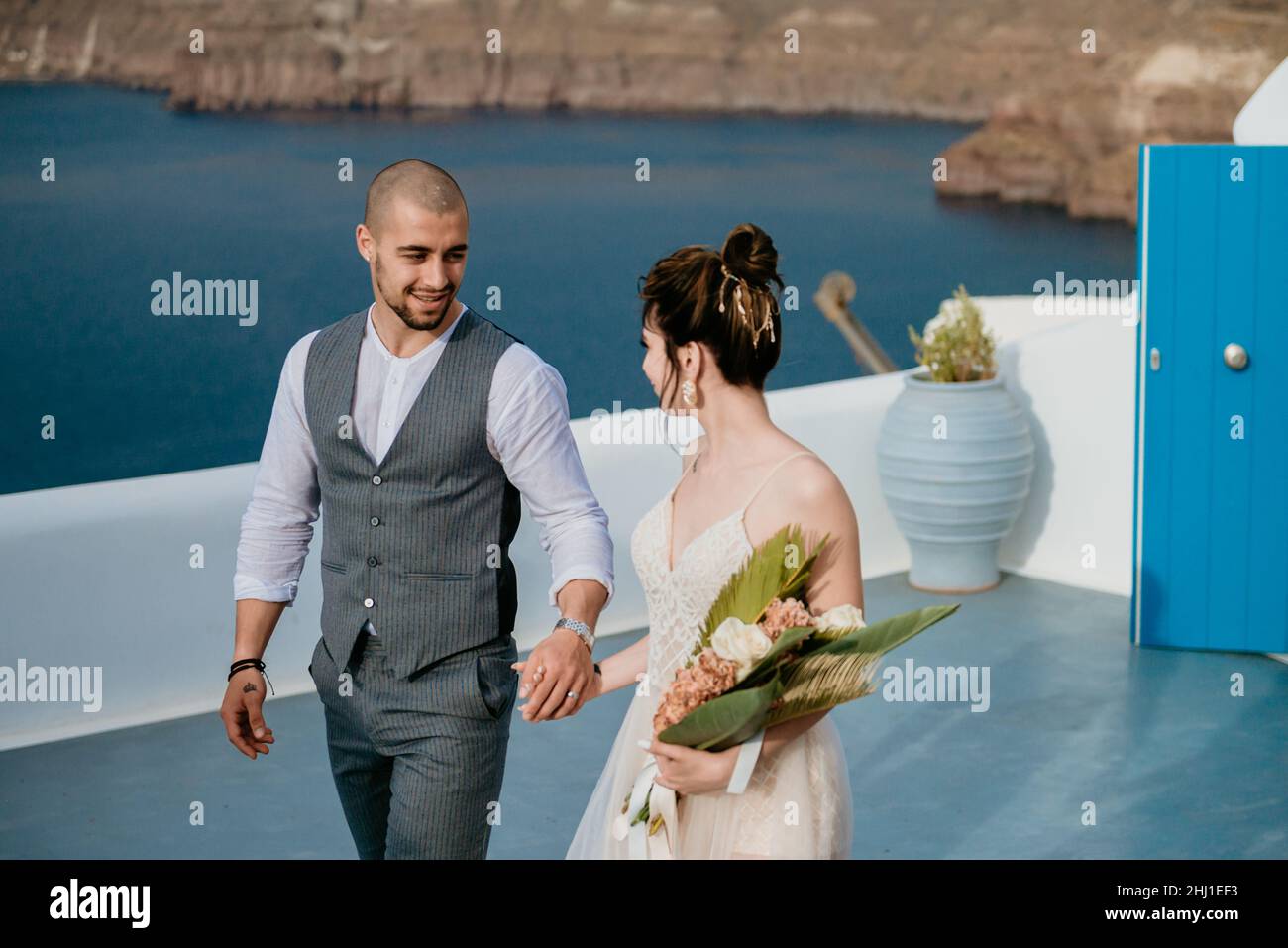 Beautiful Bride and Groom in their Summer Wedding Dy on Greek Island ...