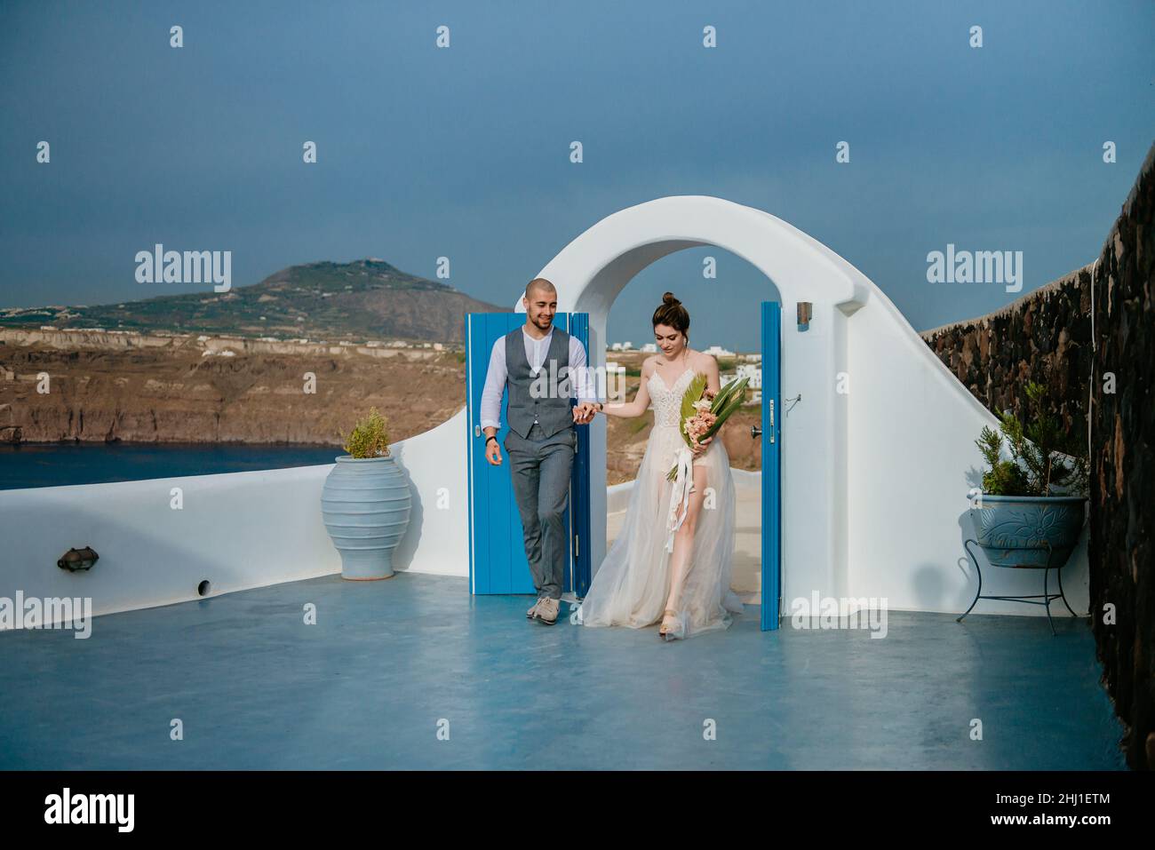 Beautiful Bride and Groom in their Summer Wedding Dy on Greek Island ...