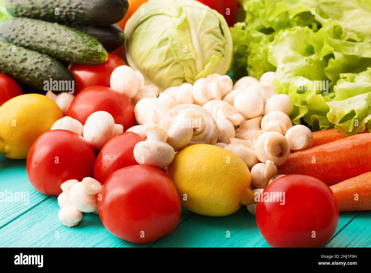 Different types of vegetables on the kitchen table. selective focus ...