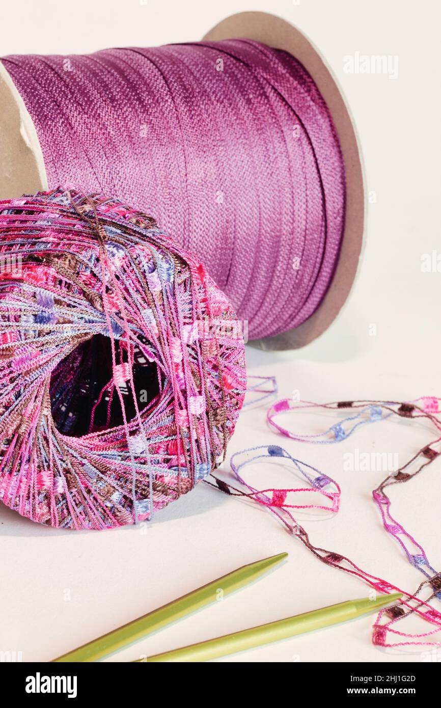 Still Life of fancy Knitting Yarn and Needles Stock Photo - Alamy