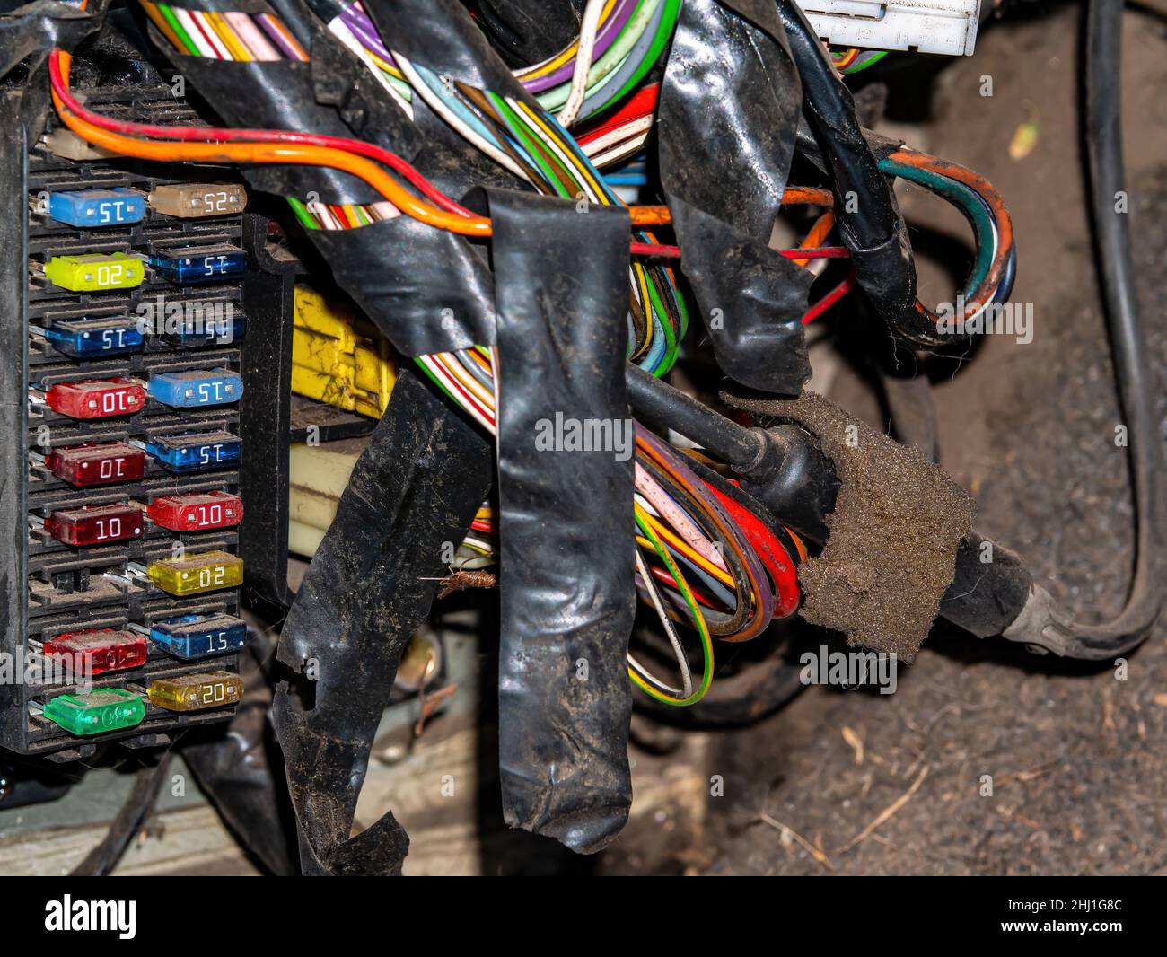 Colored wires and fuse box of the car's internal electrical wiring ...