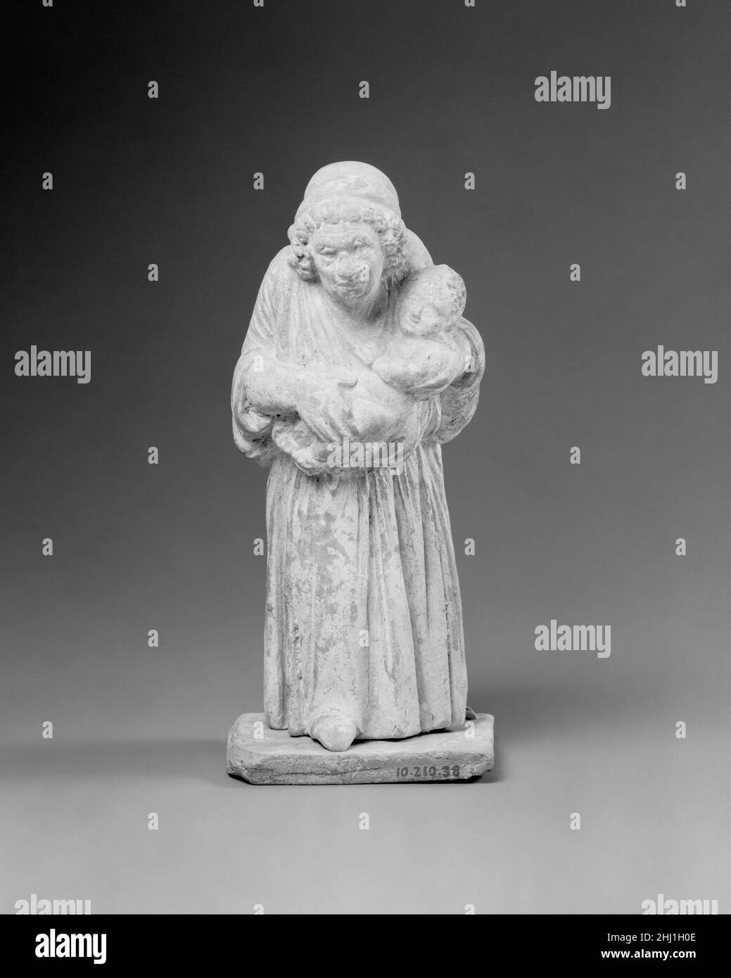Terracotta statuette of an old nurse holding a child last quarter of ...
