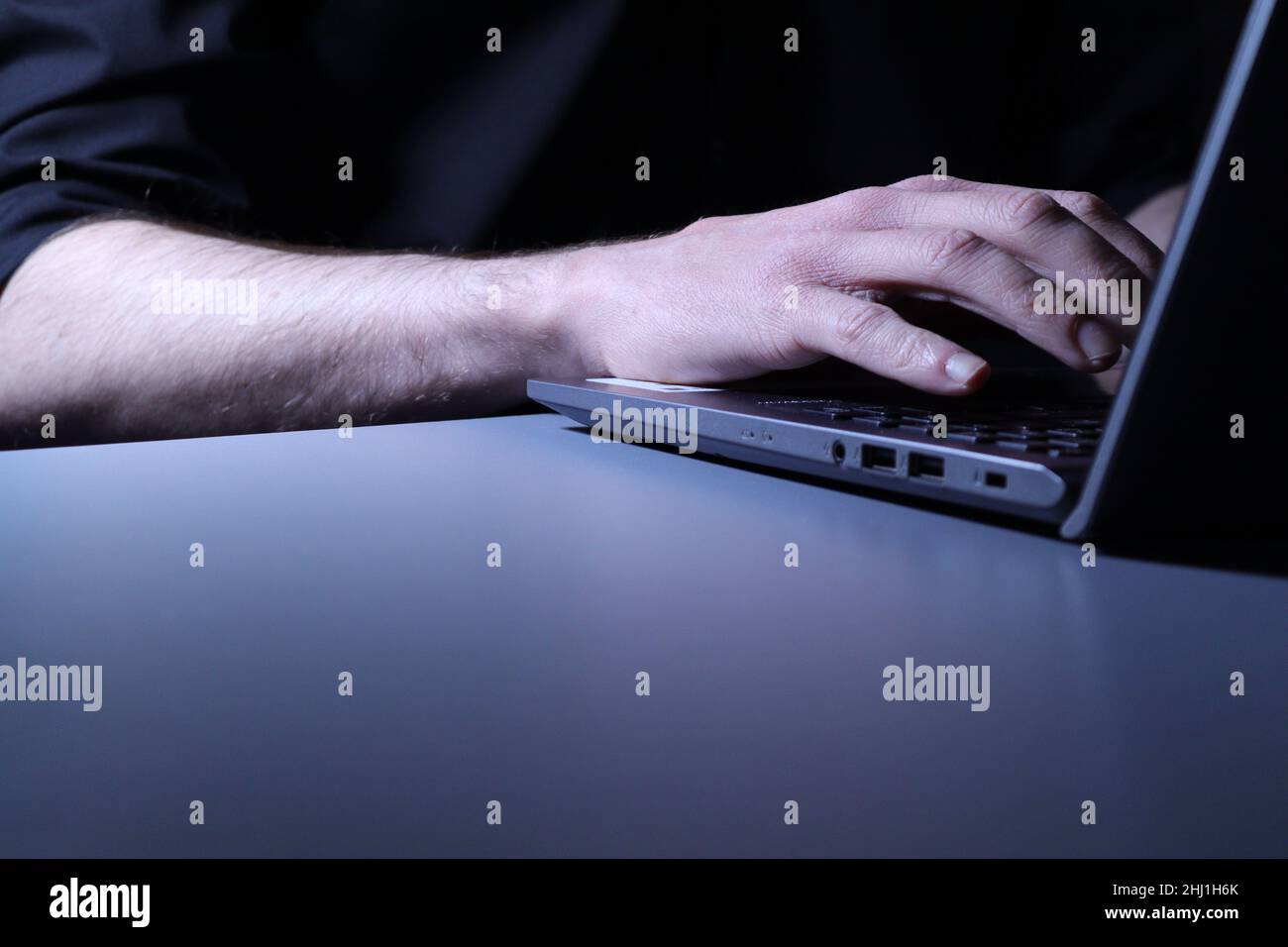 Person typing computer sinister hi-res stock photography and images - Alamy