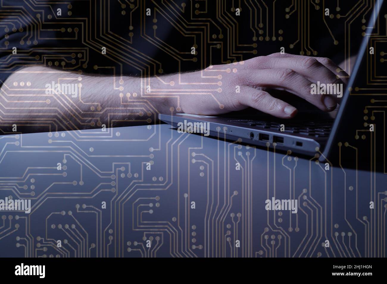 Hands at laptop with motherboard circuit overlay graphic Stock Photo ...