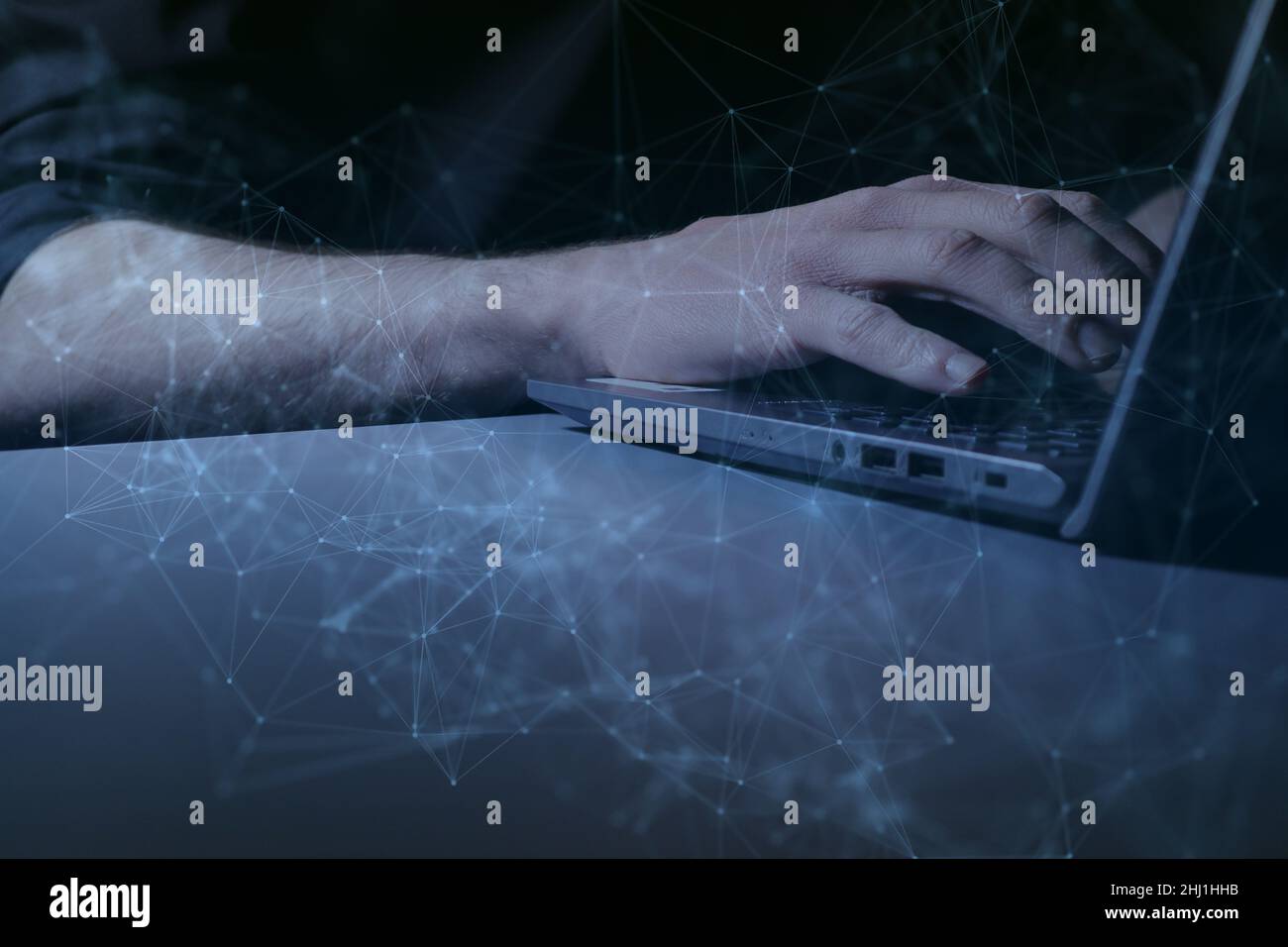 Hands at laptop with interconnectivity graphic overlay Stock Photo - Alamy