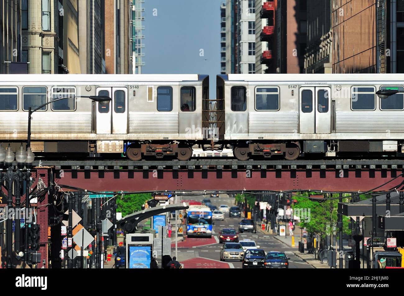 Chicago, Illinois, USA. Elevated trains pass on elevated tracks in ...