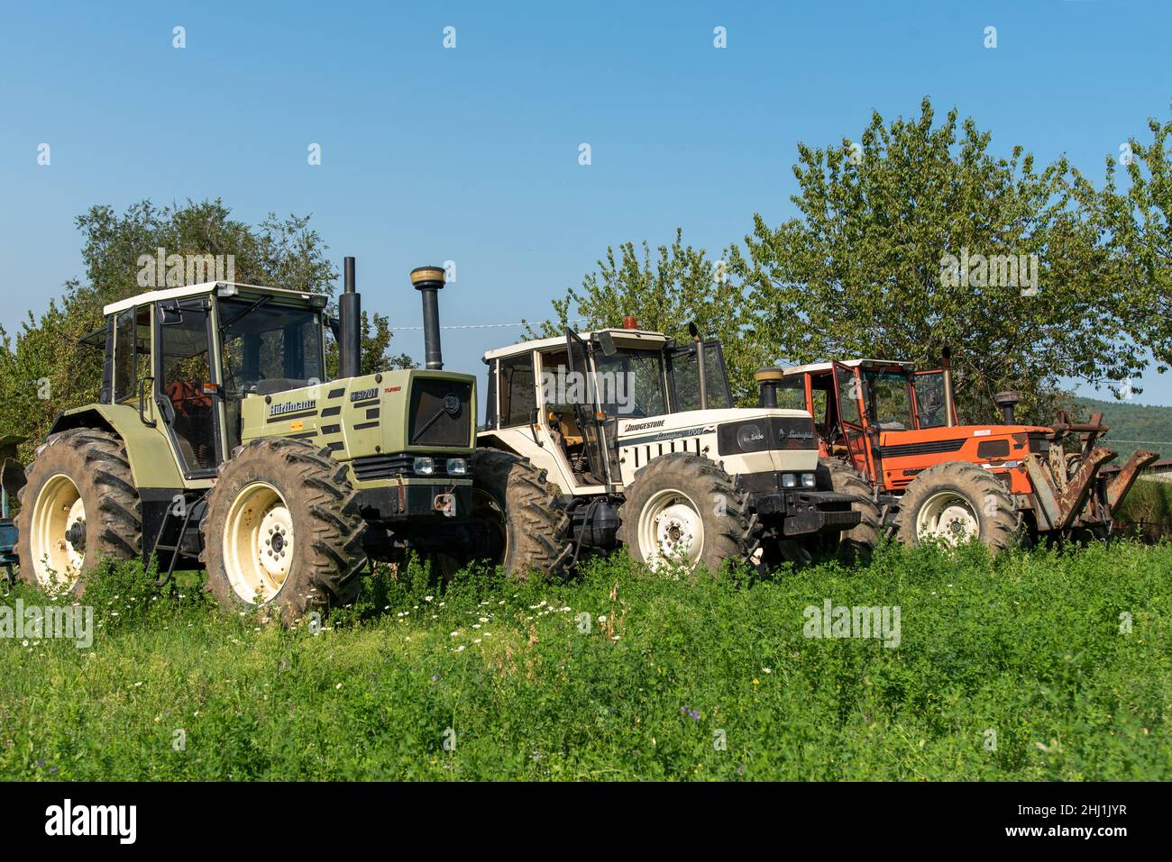 Same tractors hi-res stock photography and images - Alamy