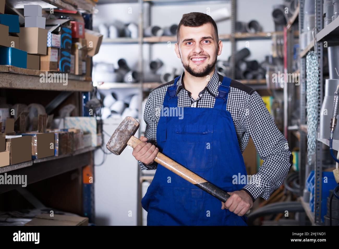 Man with a sledge hammer hi-res stock photography and images - Alamy
