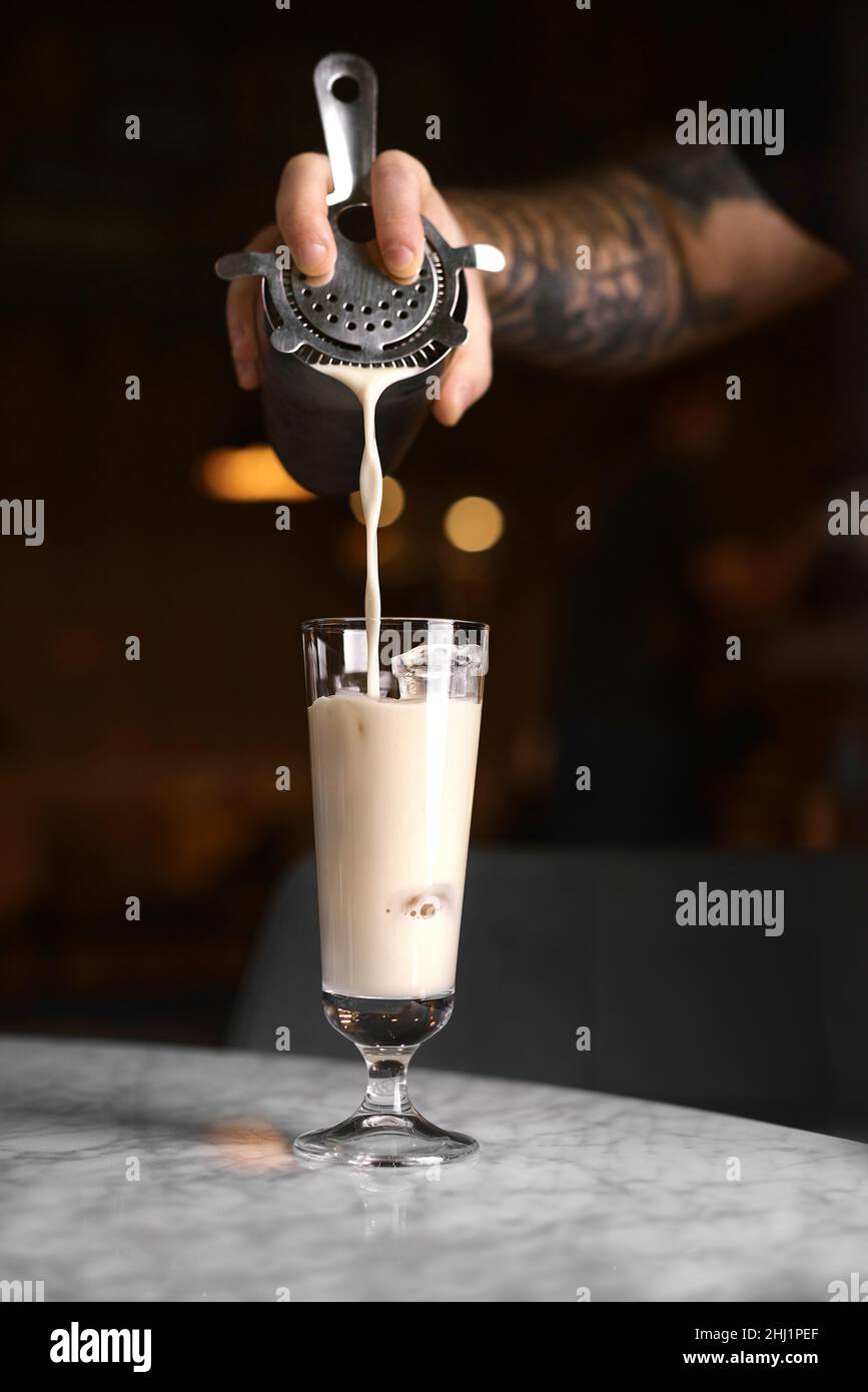 Creamy mocktail. Cold non-alcoholic cocktail with lemon juice and ...