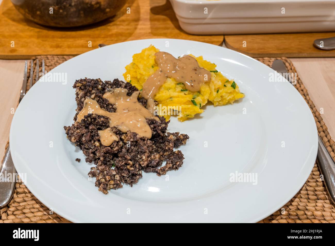 Traditional Scottish Burns Night supper dinner plate: haggis and ...