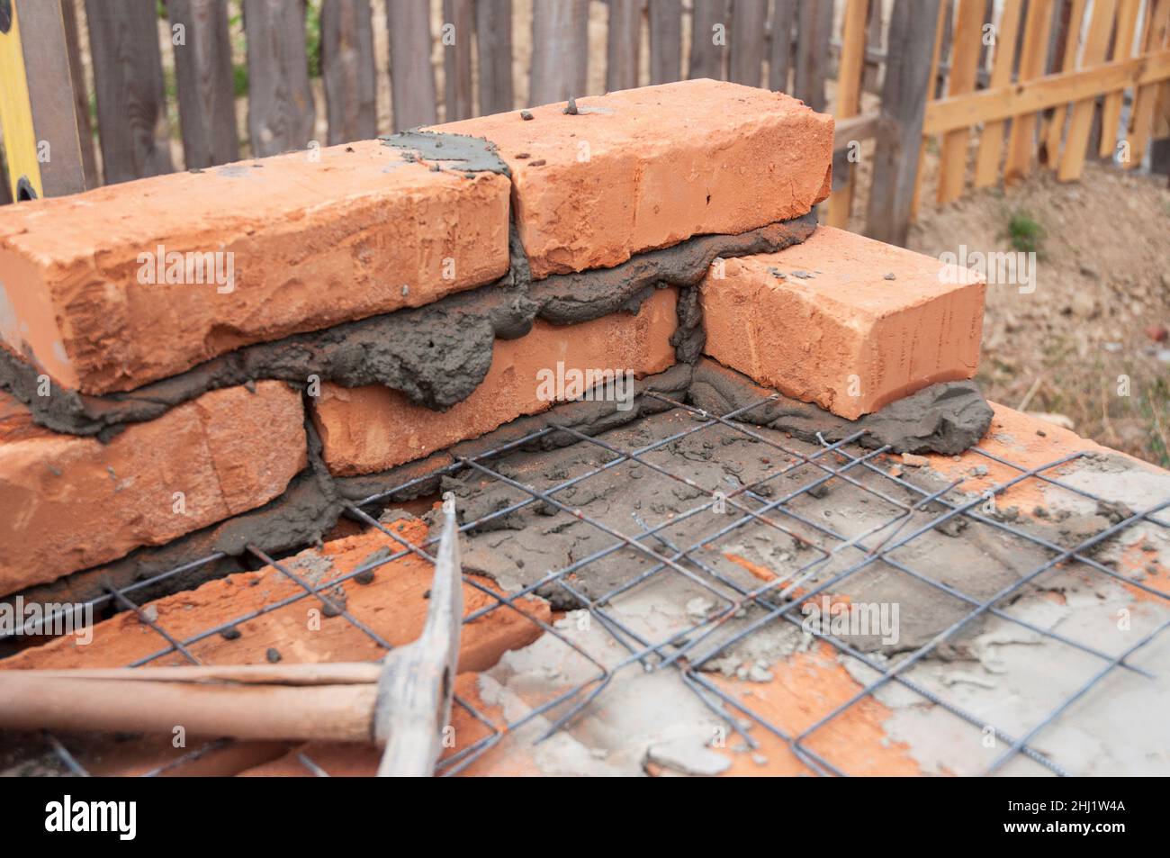 Bricklaying, Brickwork, with Iron Bars, Rebar or Reinforcing Steel Bars ...