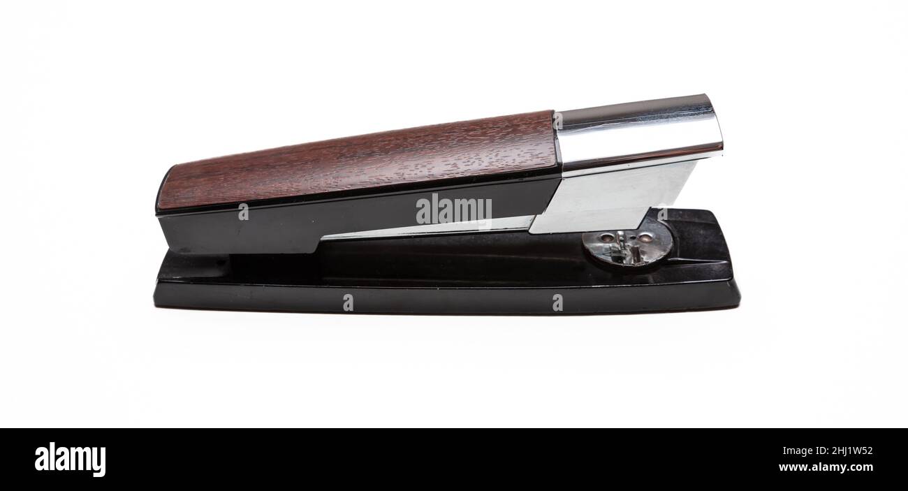 Stapler brown color wood and silver metal end isolated cutout on white ...