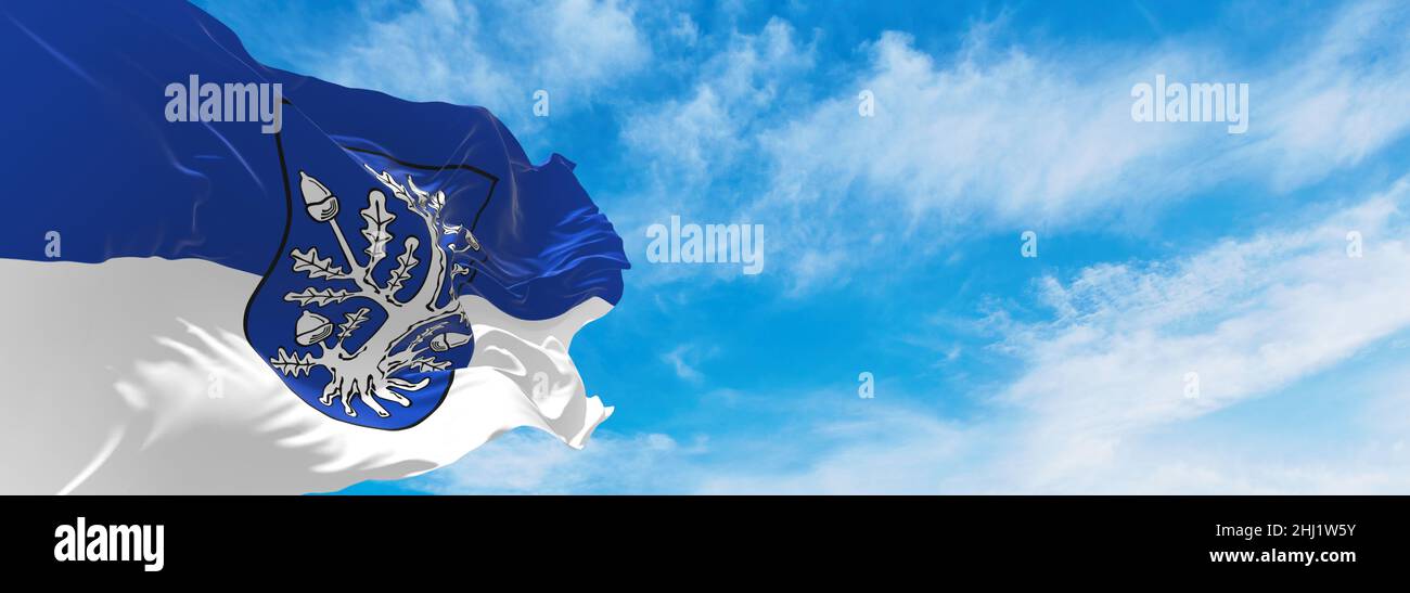flag of Offenbach am Main at cloudy sky background on sunset, panoramic ...