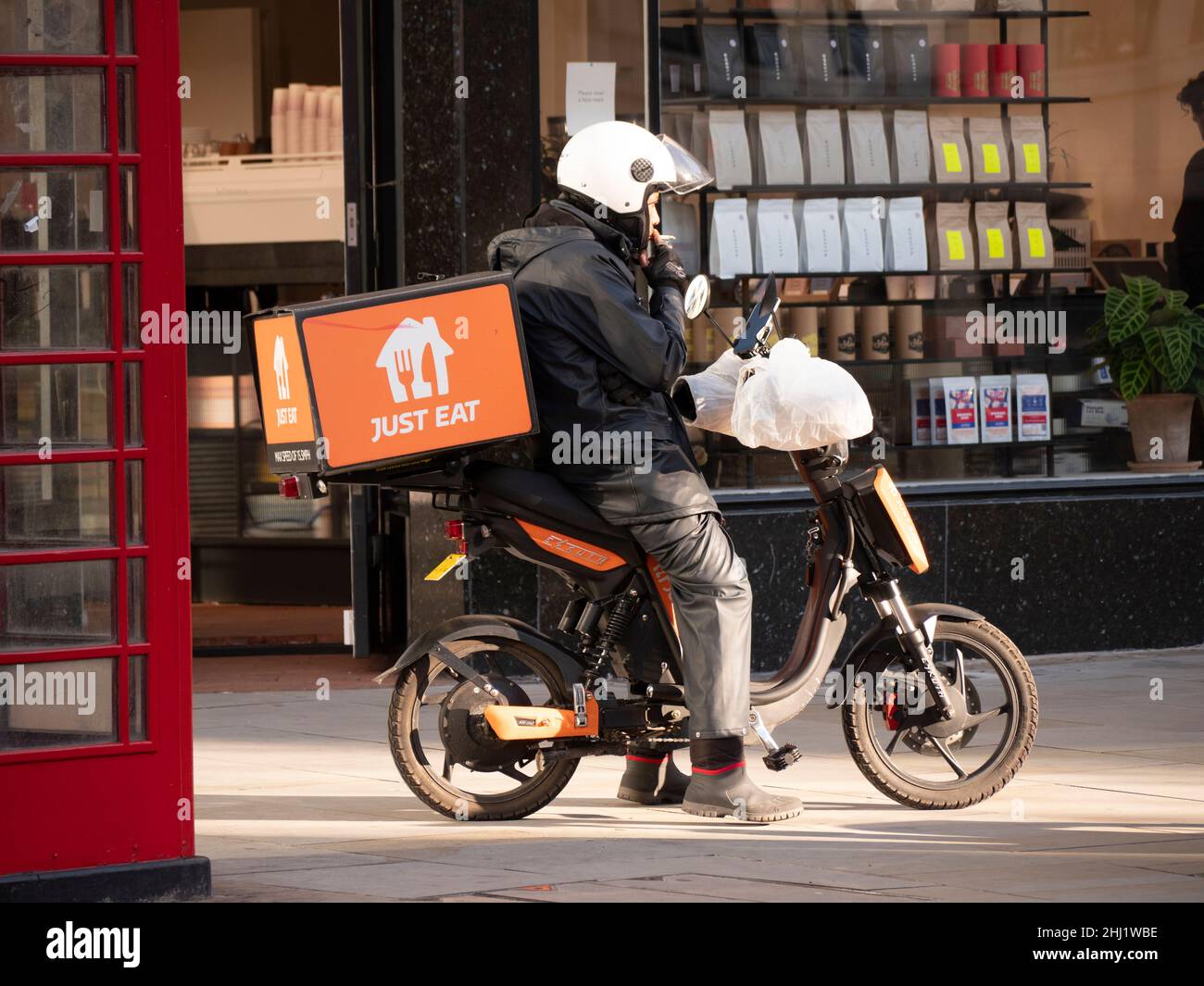 Just eat, delivery rider on Eskuta micro-mobility electric assisted ...