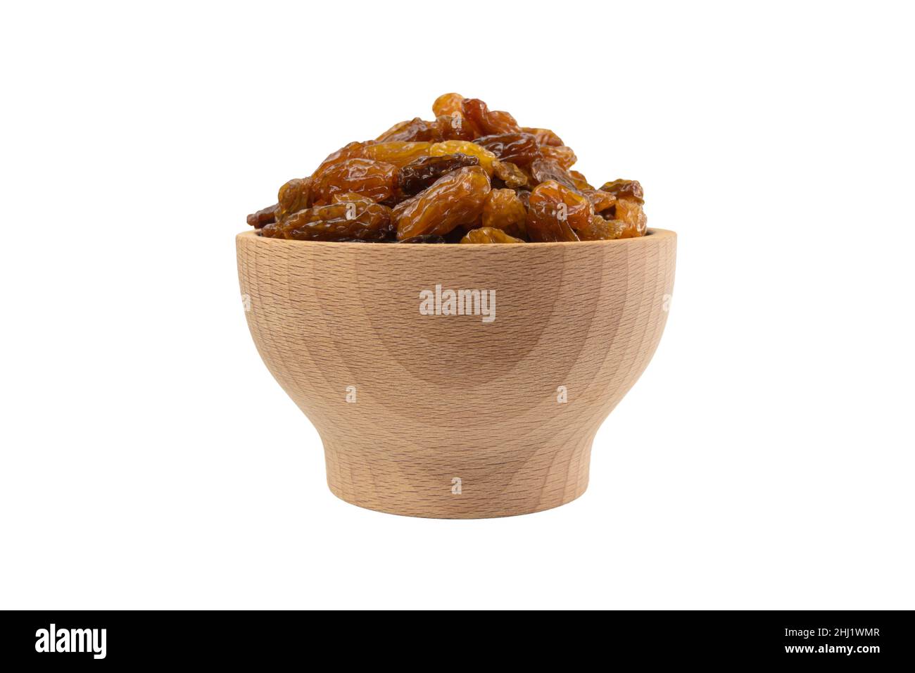 royal raisins in wooden bowl isolated on white background.Spice and ...