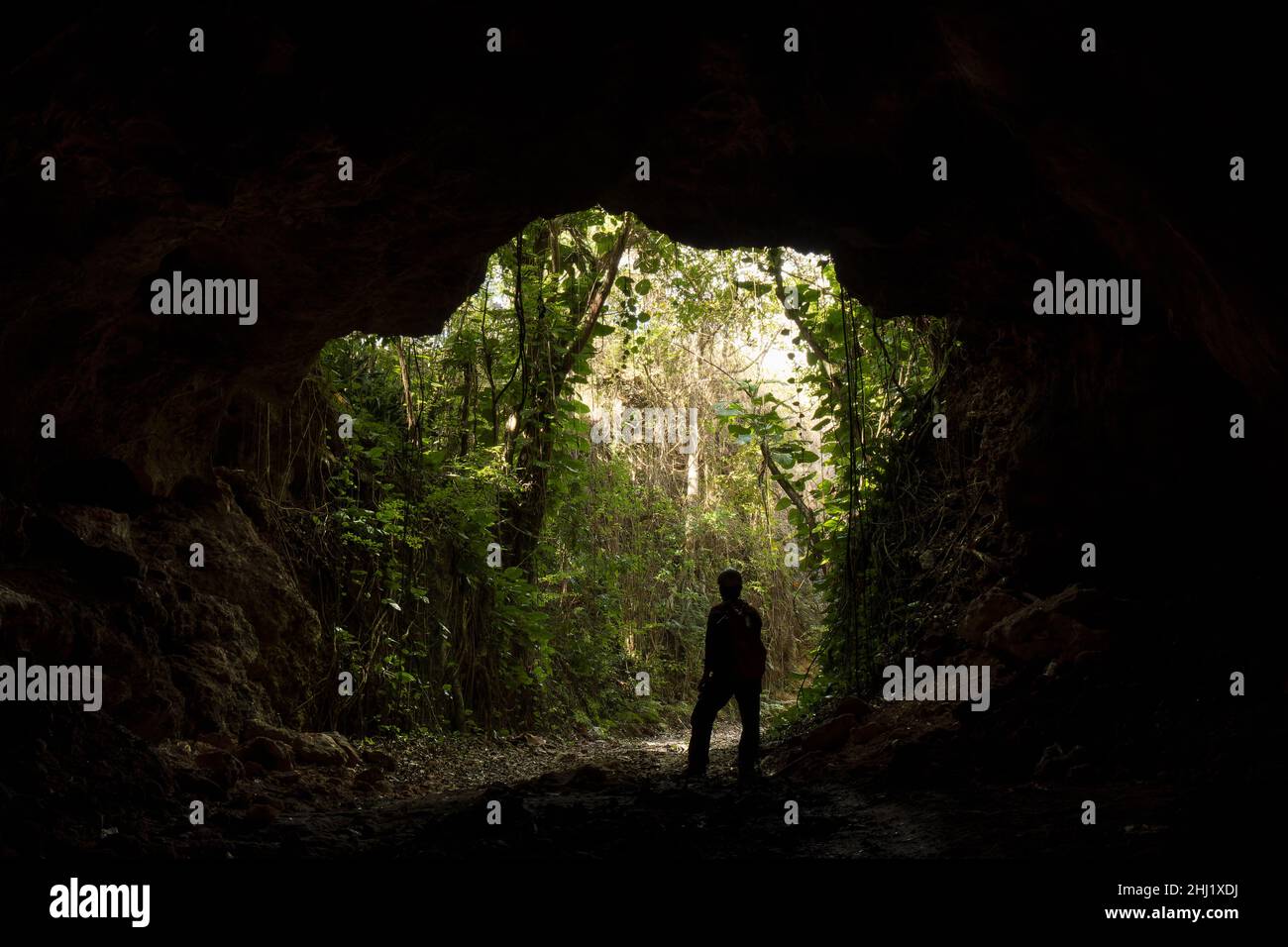Man exiting a cave hi-res stock photography and images - Alamy