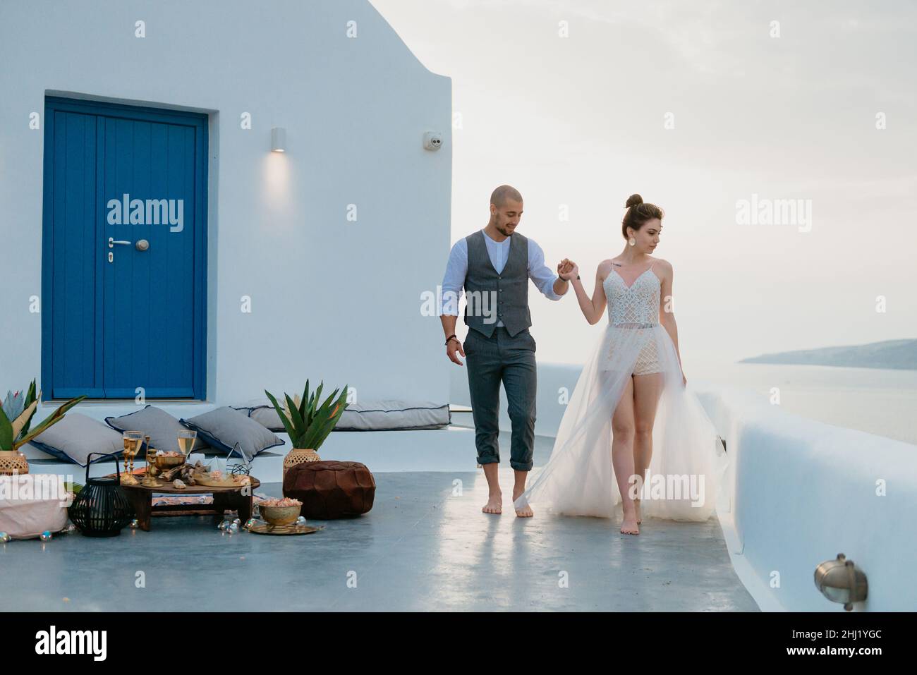 Close Up Beautiful Bride and Groom in their Summer Wedding Dy on Greek ...