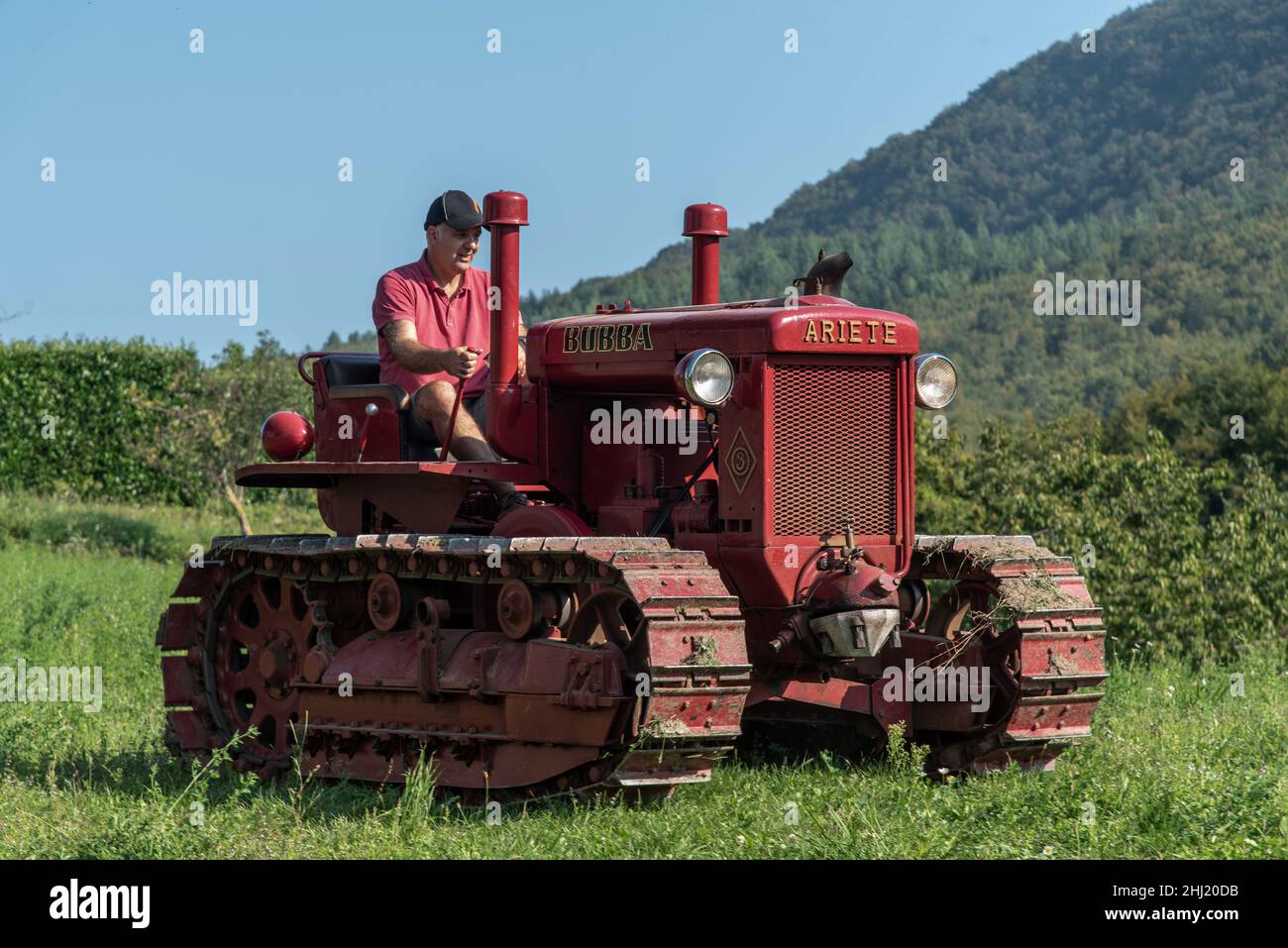 Italian boy drives an antique Bubba Ariete tractor Stock Photo - Alamy