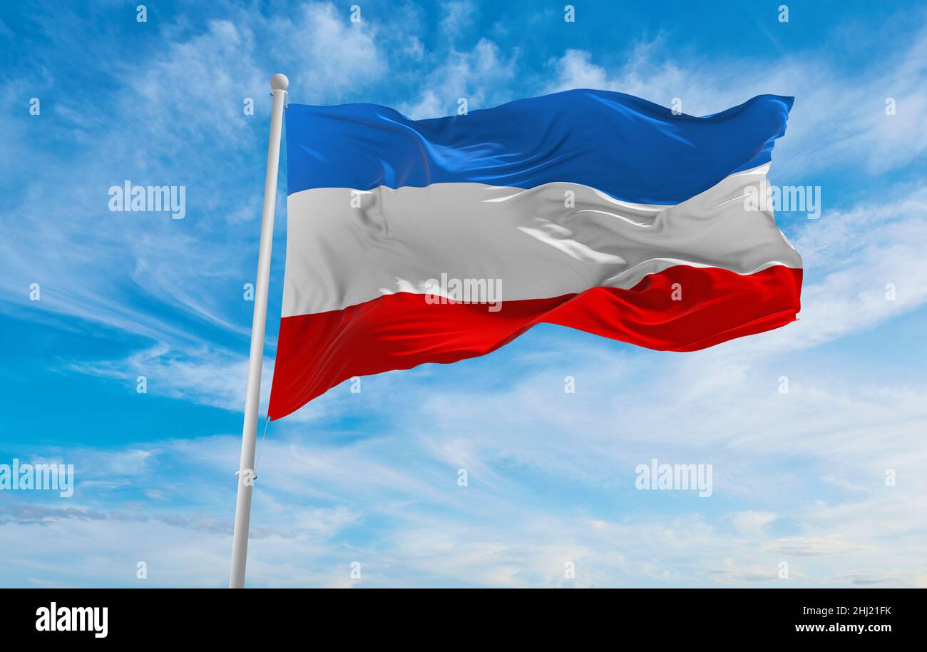flag of Mannheim at cloudy sky background on sunset, panoramic view ...