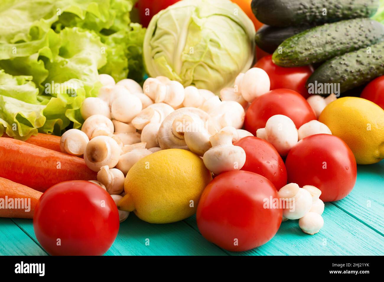 Different types of vegetables on the kitchen table. selective focus ...