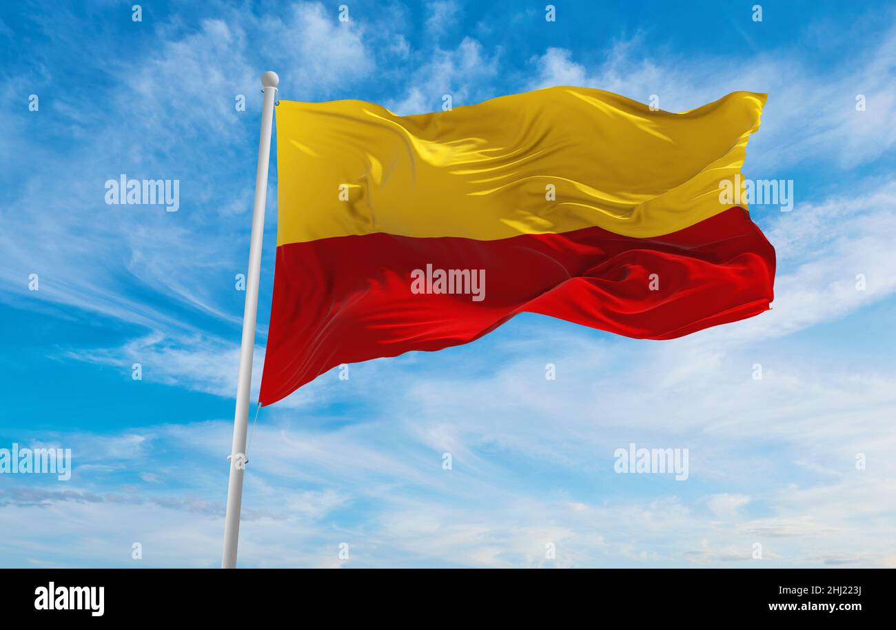 flag of Munich lozengy at cloudy sky background on sunset, panoramic ...