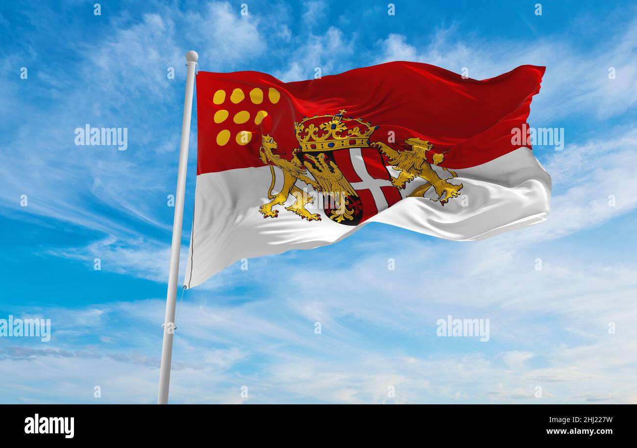 flag of Neuss at cloudy sky background on sunset, panoramic view ...