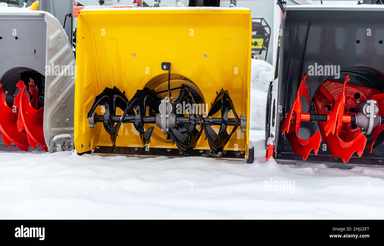 A new petrol snowplow is on sale. Snow removal mechanism Stock Photo ...