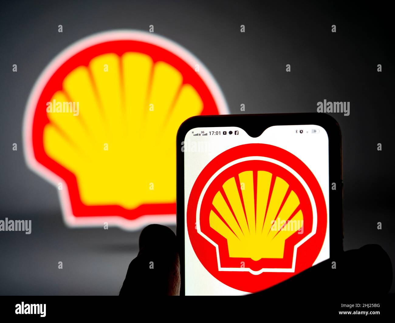 In this photo illustration, the Royal Dutch Shell logo is seen ...