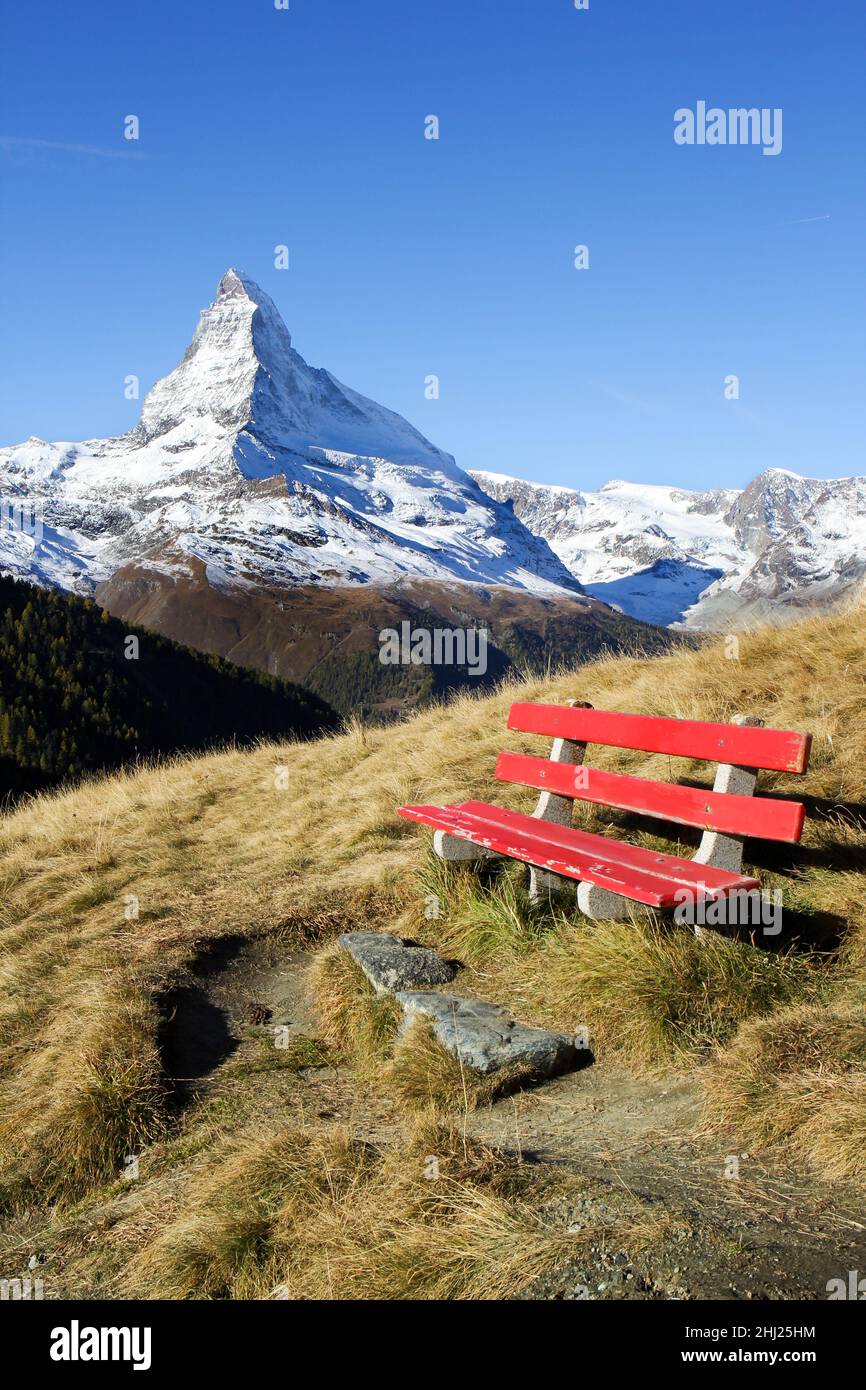 Red bench with Matterhorn at the background, Zermatt, Switzerland Stock ...