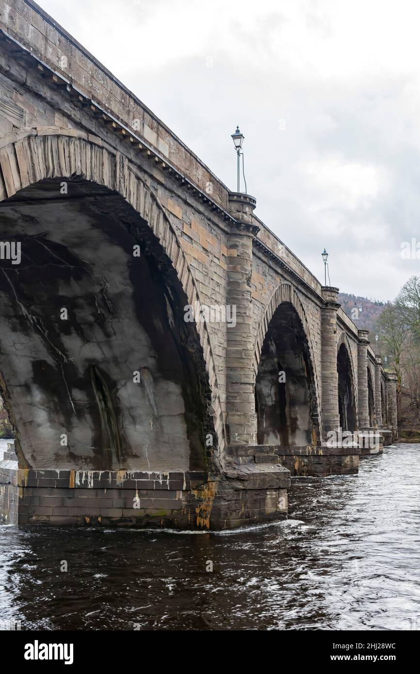 Overcast view of the old Dunkeld Bridge in Dunkeld old town at United ...