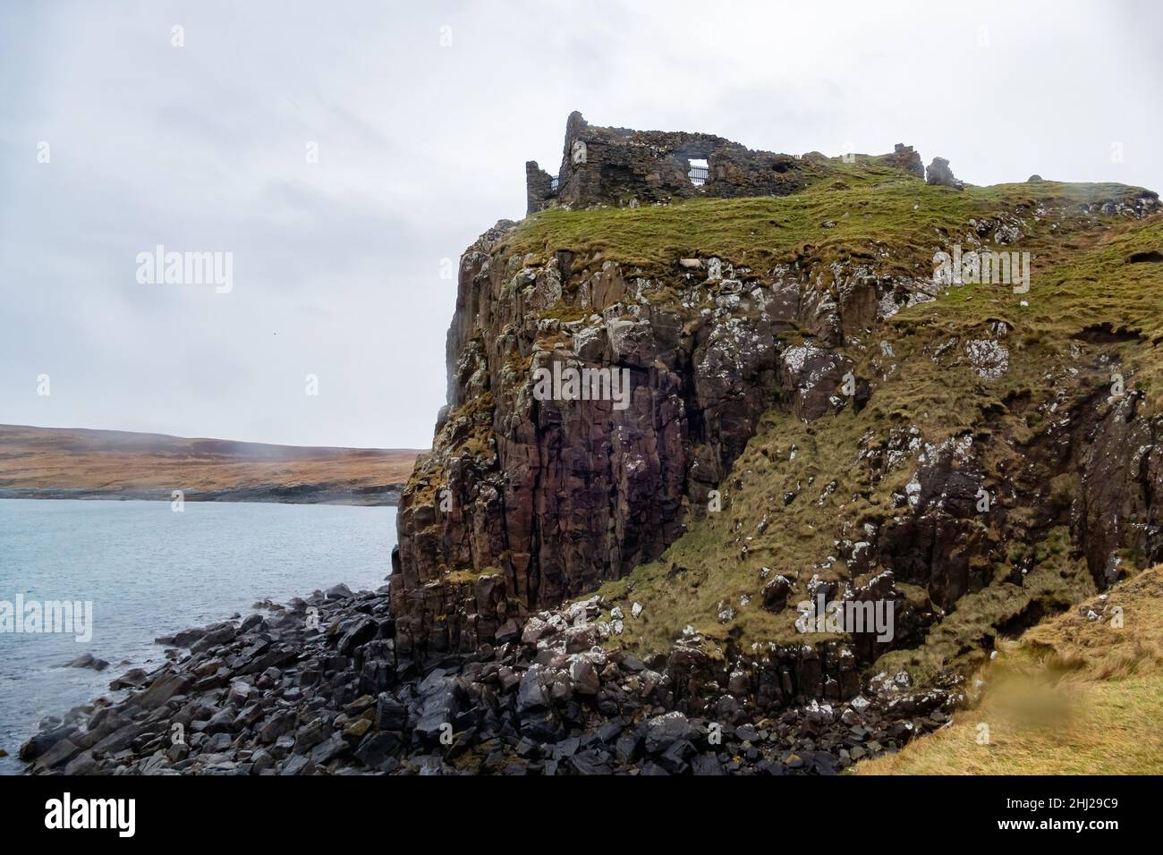 Overcast view of the Duntulm Castle ruins at Isle of Skye, Scotland ...