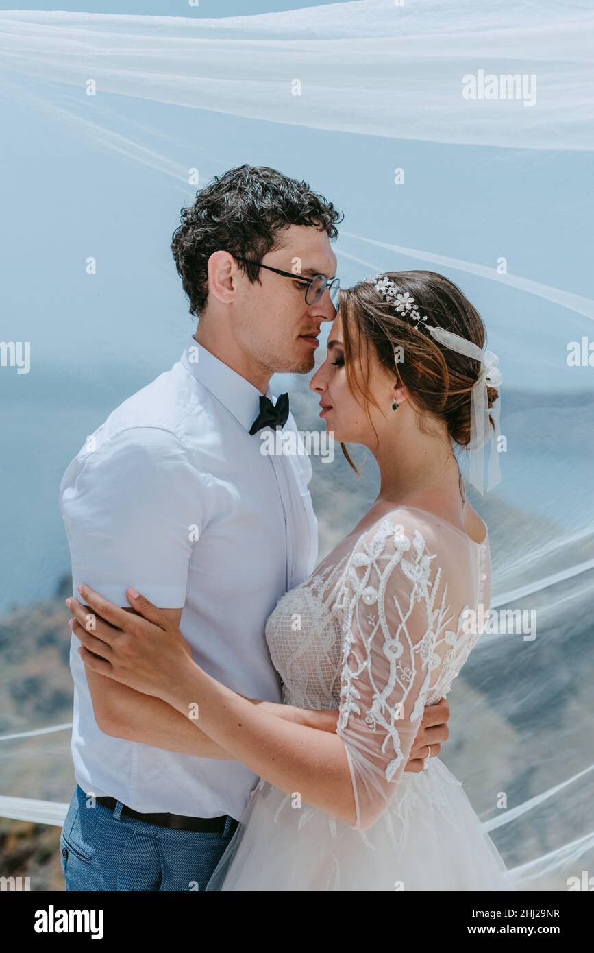 Santorini couple kissing hi-res stock photography and images - Alamy