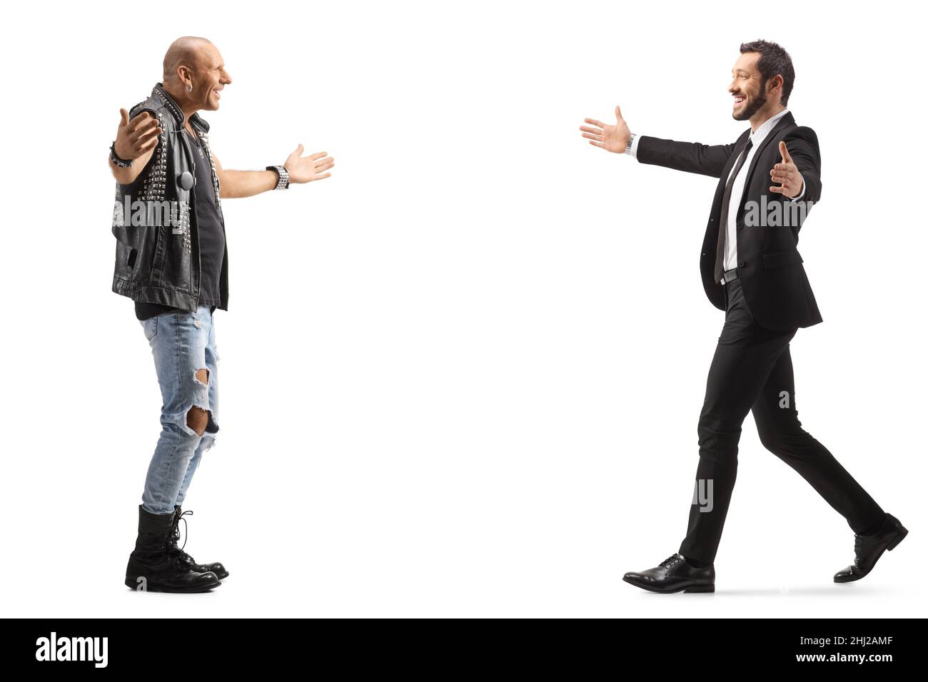 Full length profile shot of a businessman and a punk meeting with arms ...