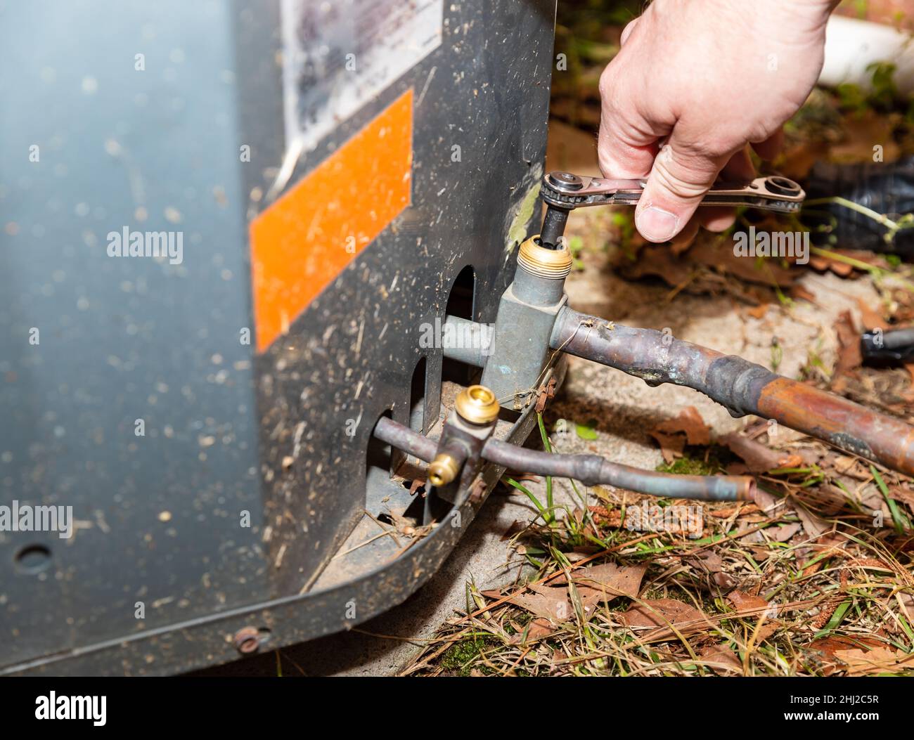 Worker closing valve hi-res stock photography and images - Alamy