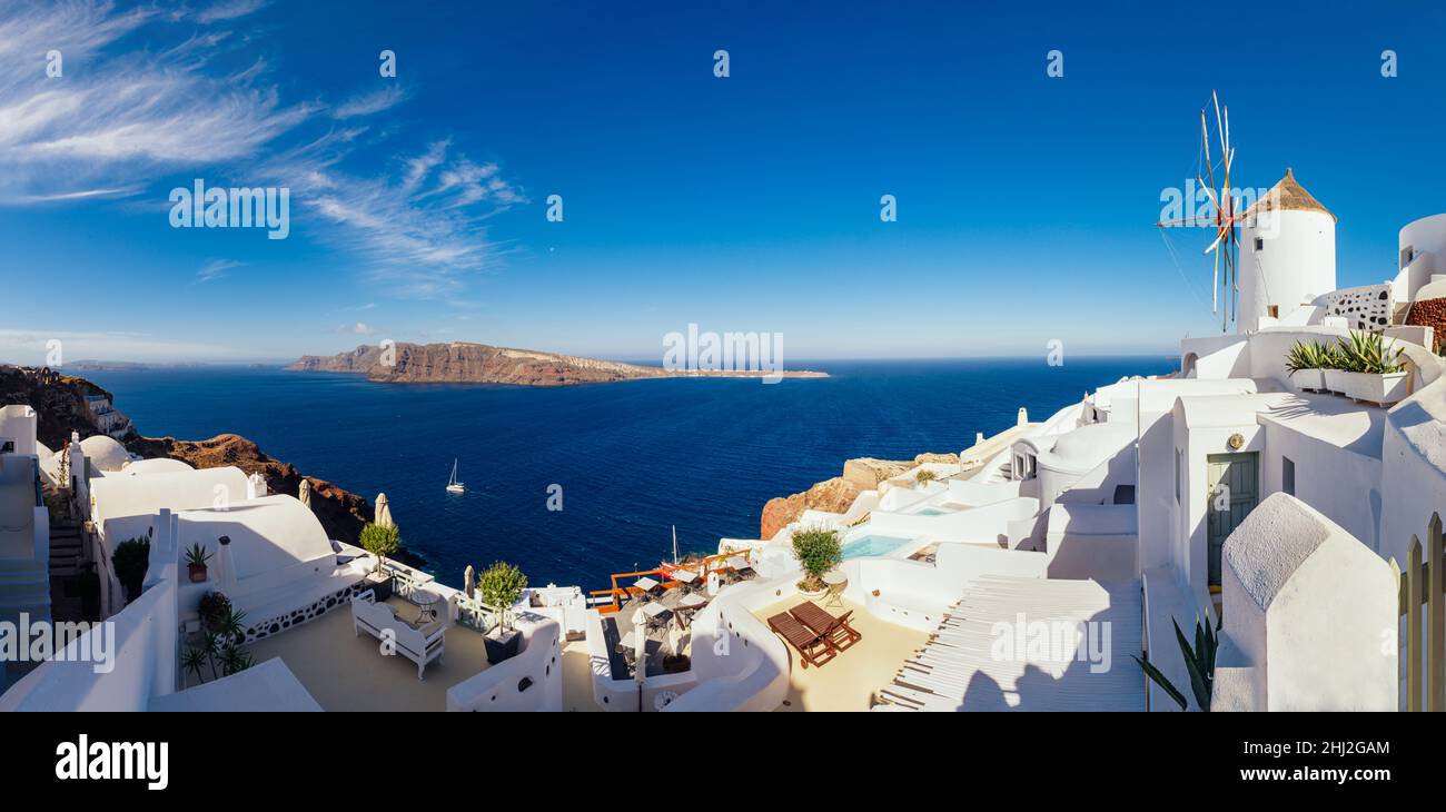Panorama of Oia Santorini in summer. White buildings of santorini. Mill ...