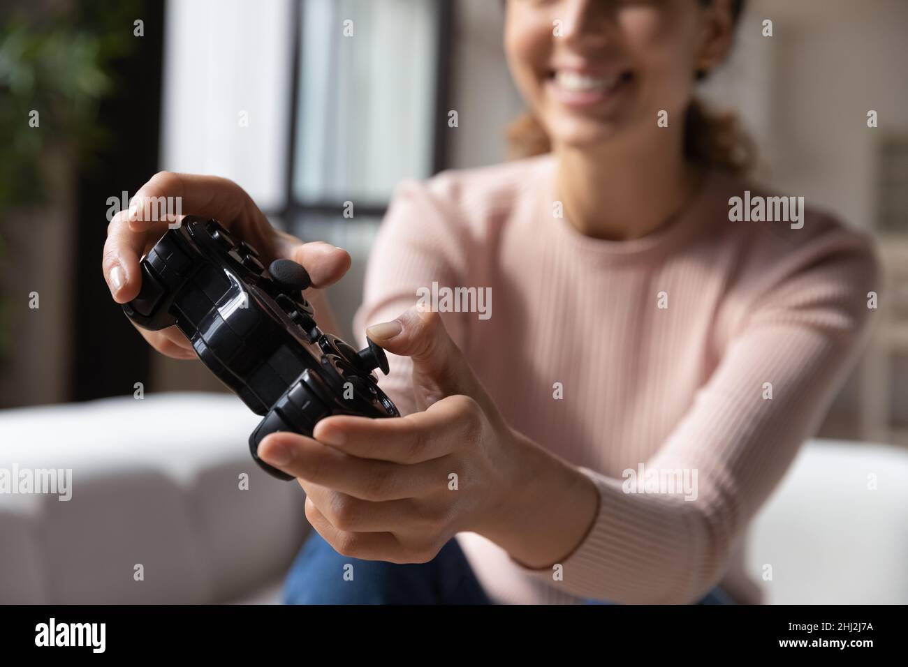 Woman hands holding controller hi-res stock photography and images - Alamy