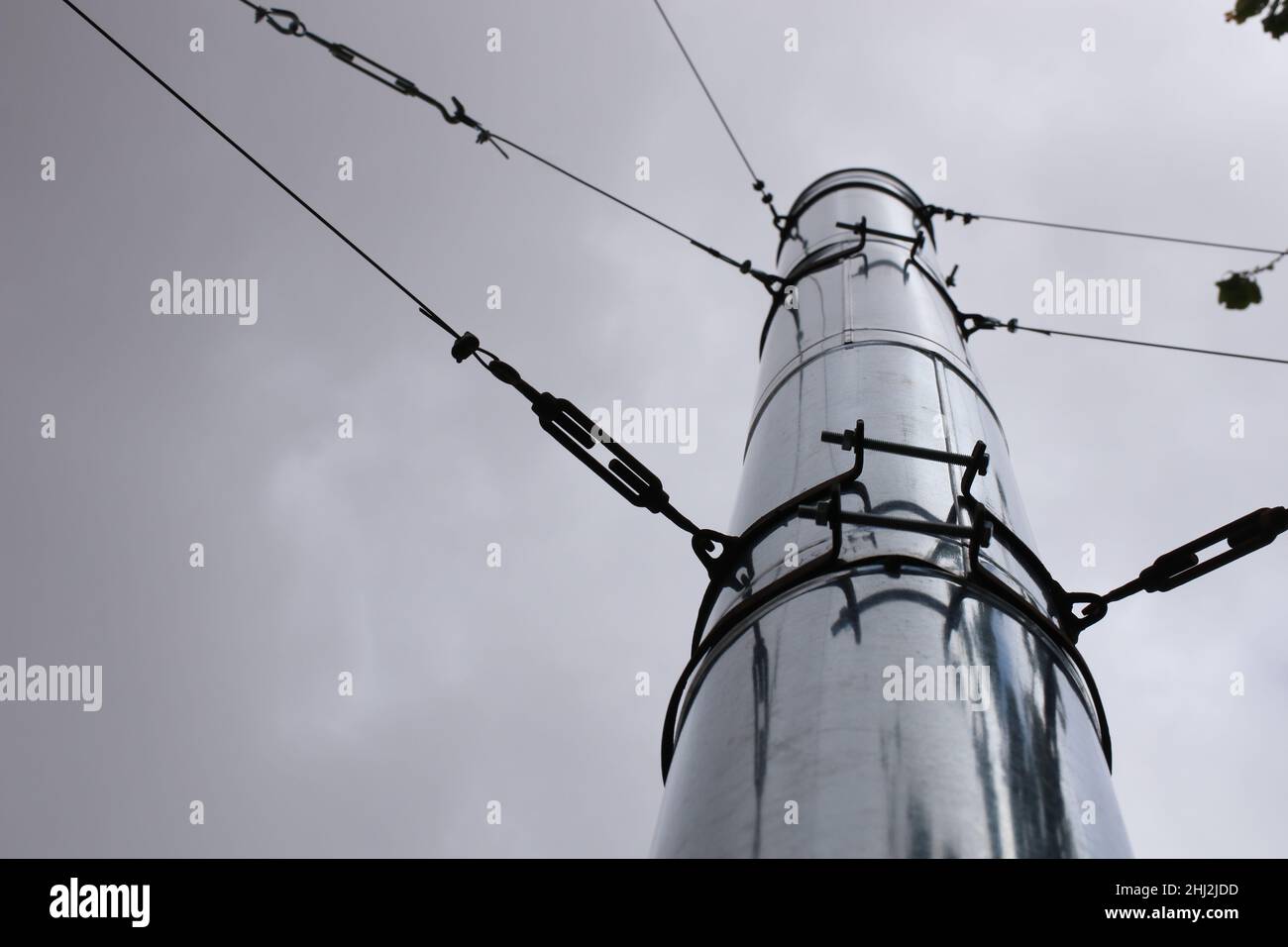 The chimney is held by tensioned cables. Heating rural house Stock ...