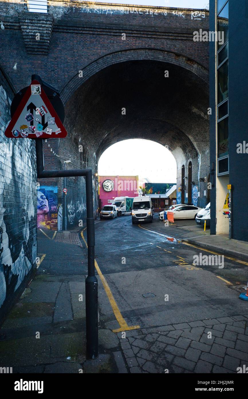 Railway arch and roadsign at the Custard Factory in Digbeth, Birmingham ...