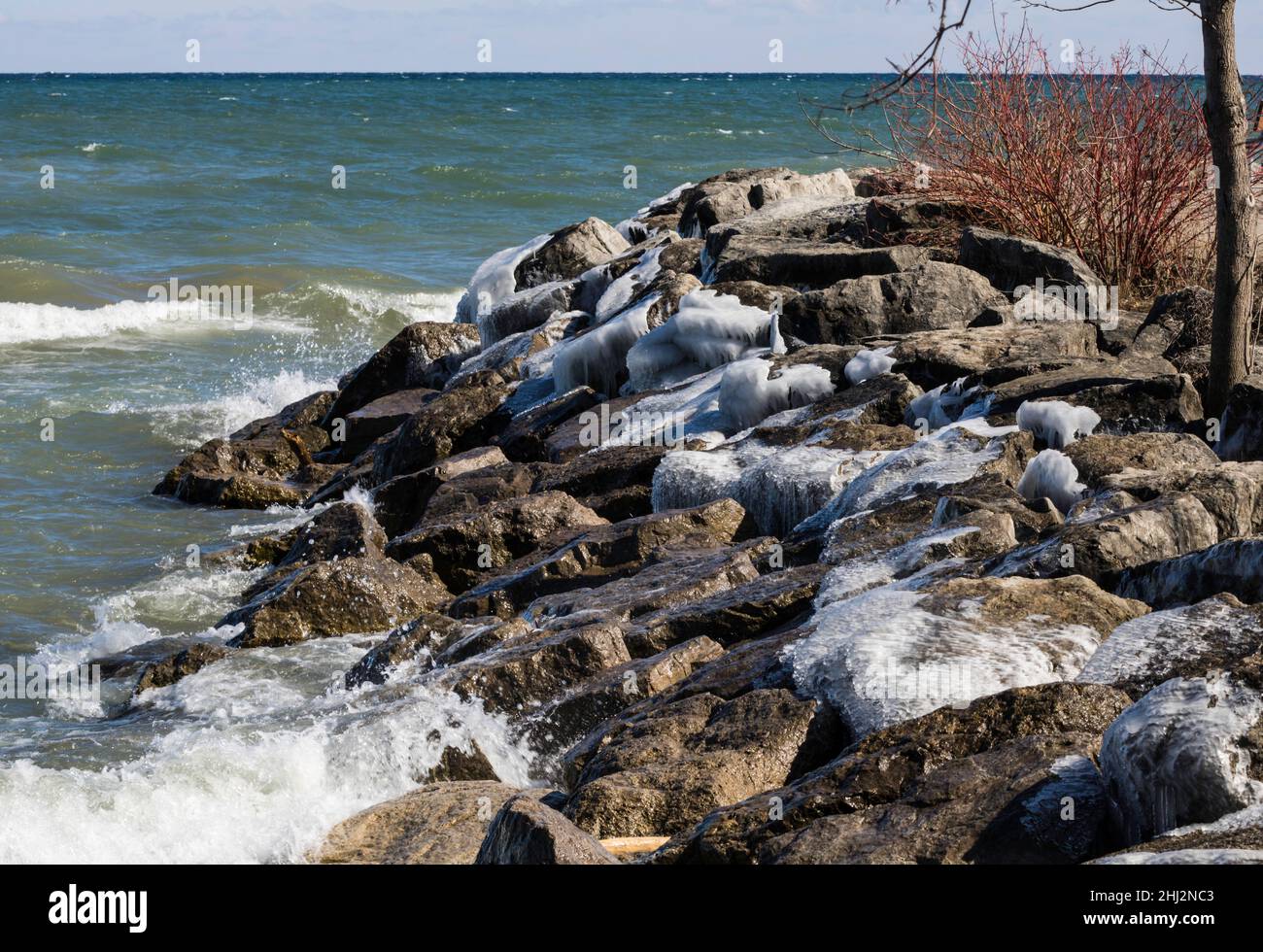 Ice forming on rocks Stock Photo - Alamy