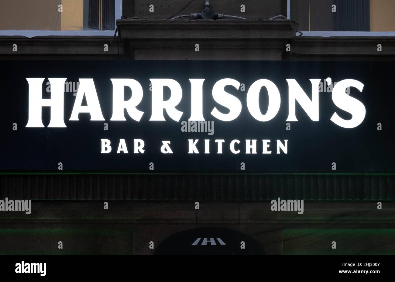 Sign outside of Harrison's Bar & Kitchen in Liverpool Stock Photo - Alamy