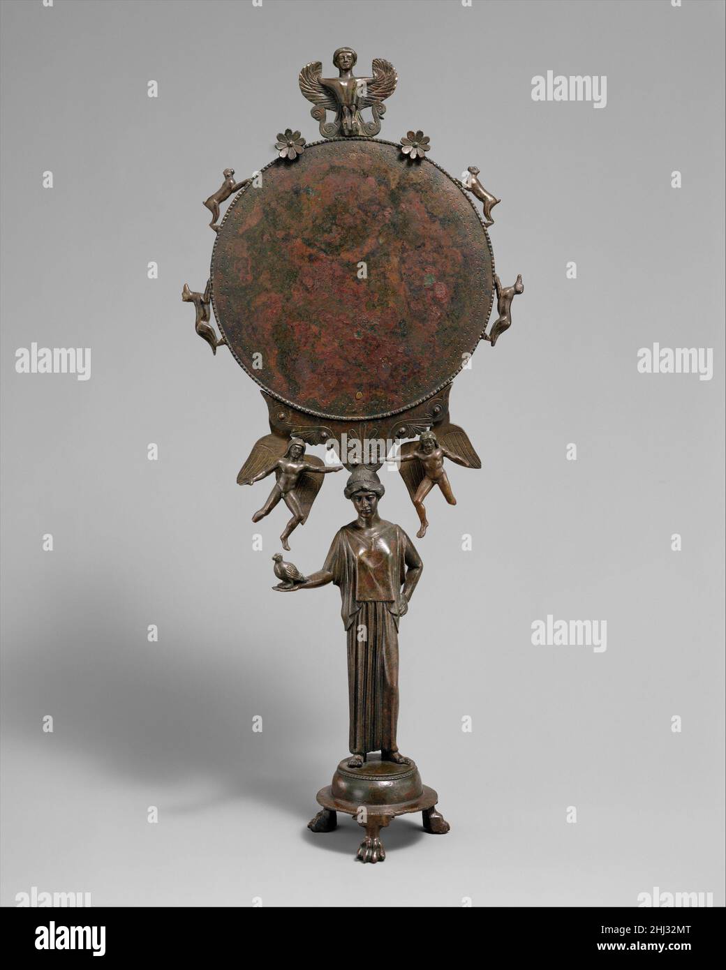 Bronze mirror with a support in the form of a draped woman mid-5th ...