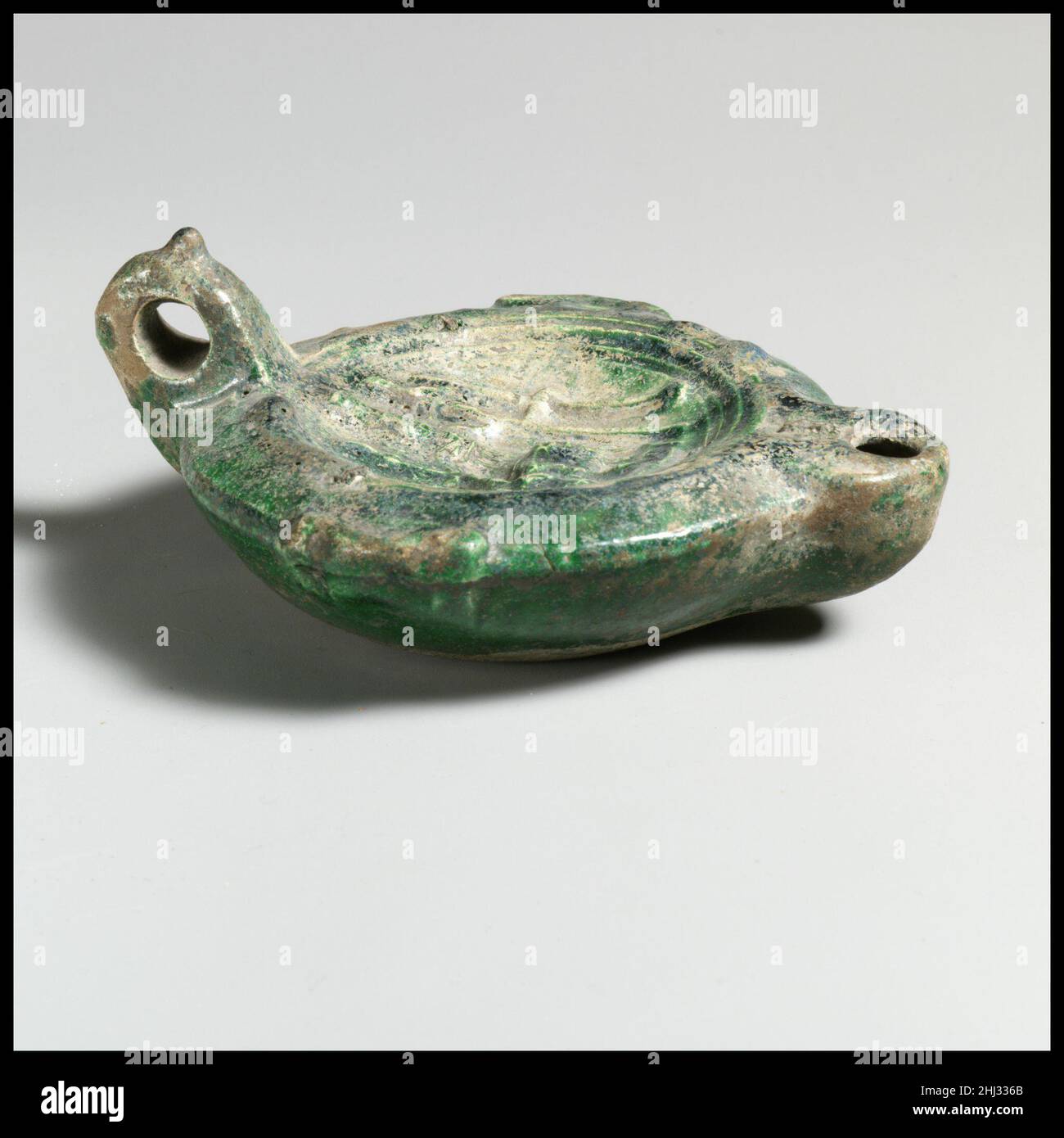 Terracotta lamp late 1st–2nd century A.D. Roman The discus on the top ...