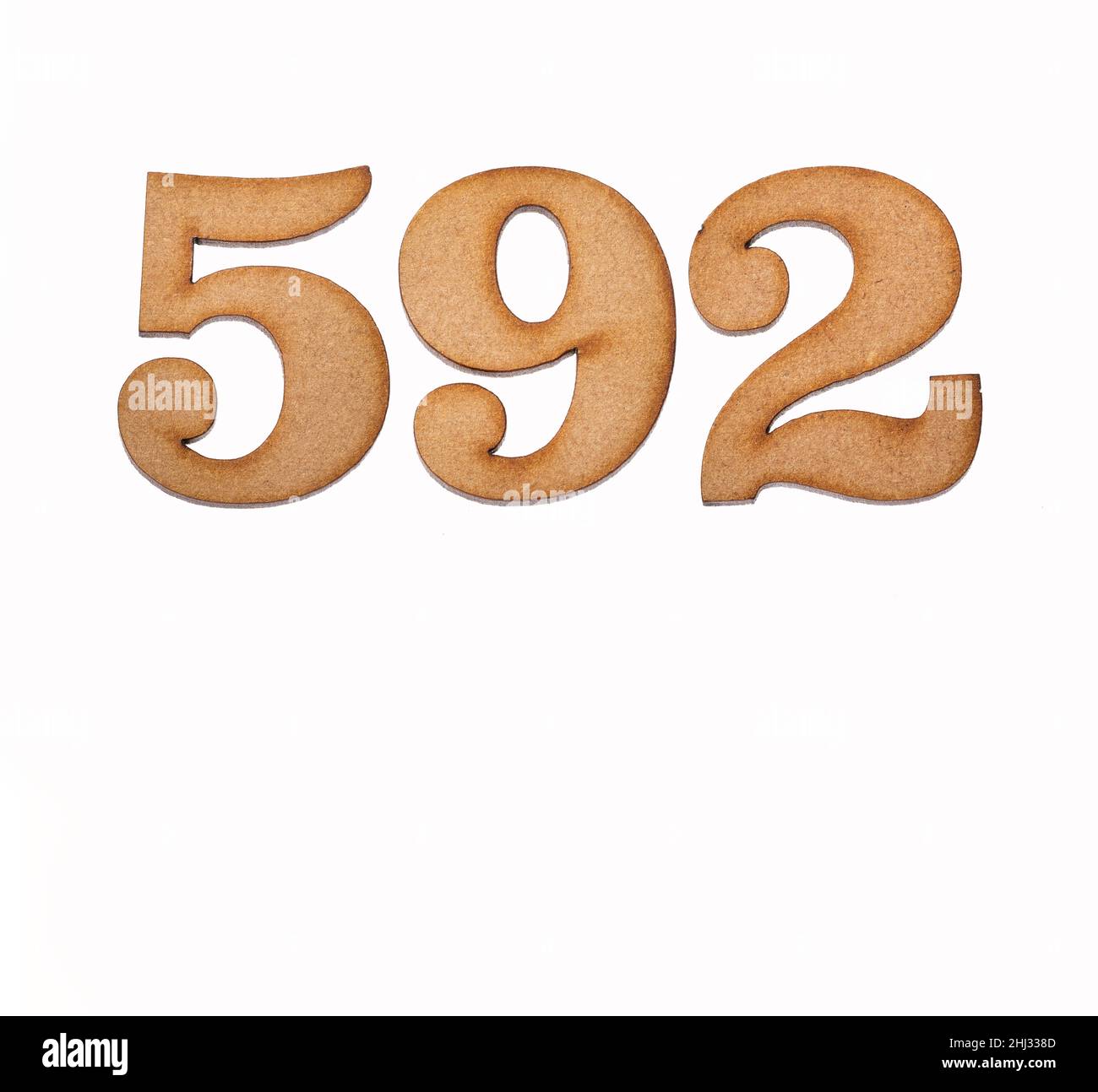 Number 592 - Piece of wood isolated on white background Stock Photo - Alamy